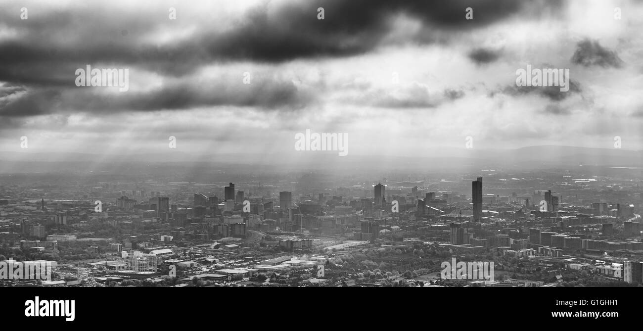 Aerial photo of Manchester with sun beams through clouds Stock Photo ...