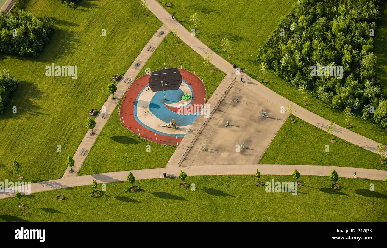 Aerial photo of playground, swirling colour, curving paths, green grass ...