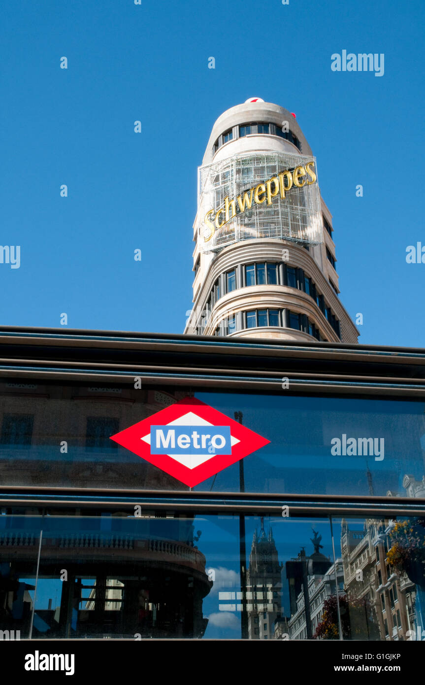 Capitol building and Metro Callao entrance. Gran Via street, Madrid ...