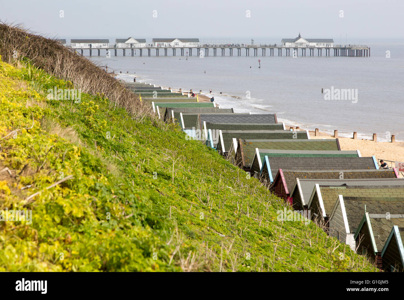 Beach huts and pier sandy beach at Southwold, Suffolk, England, UK ...