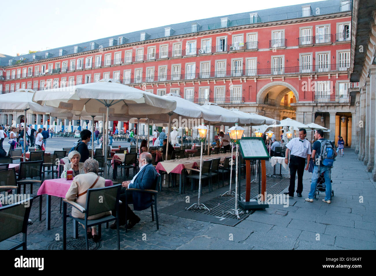 People sitting in a terrace at Main Square. Madrid, Spain Stock Photo ...