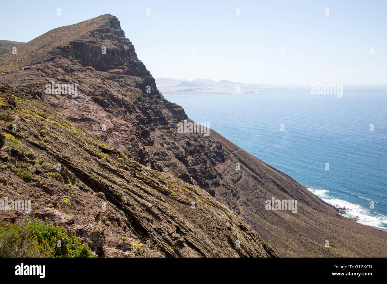 Steep coastal cliffs Risco de Famara looking south from Guinate ...