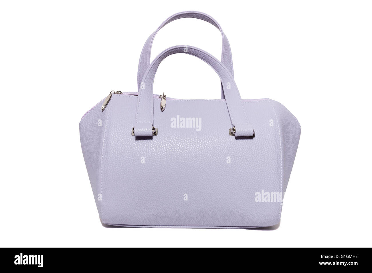 The photograph shows a female handbag on a white background Stock Photo ...