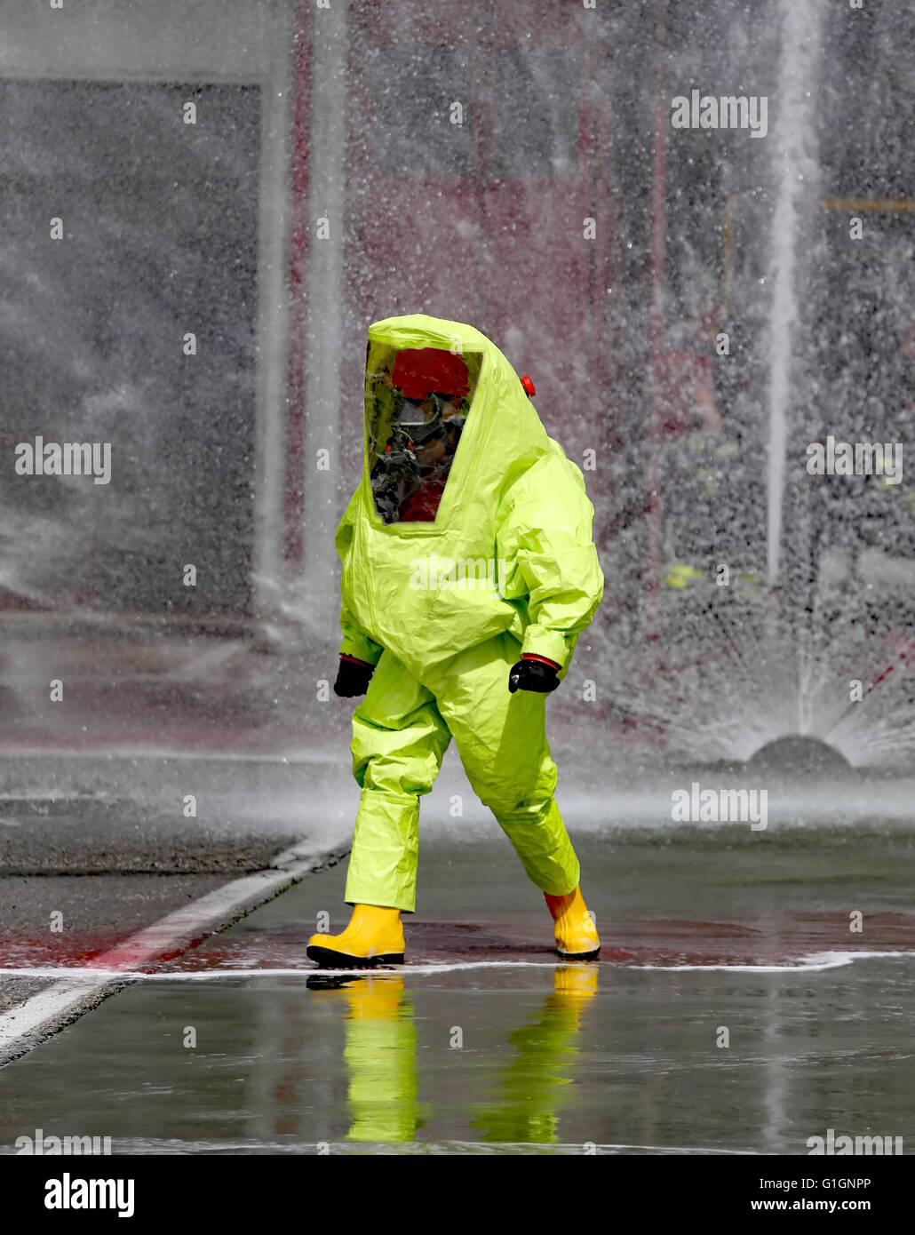 man with yellow protective gear against biological risk Stock Photo - Alamy