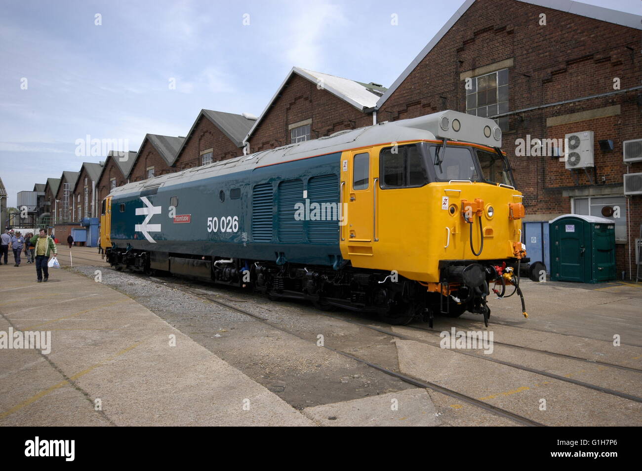 Diesel and steam locomotives in a yard Stock Photo - Alamy