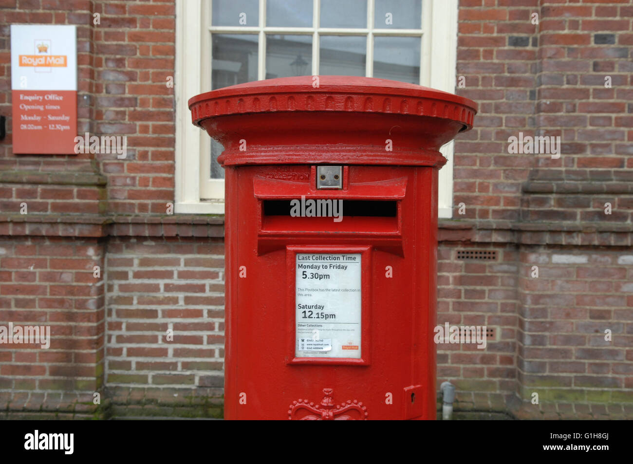Red post box in Kent - UK Stock Photo - Alamy