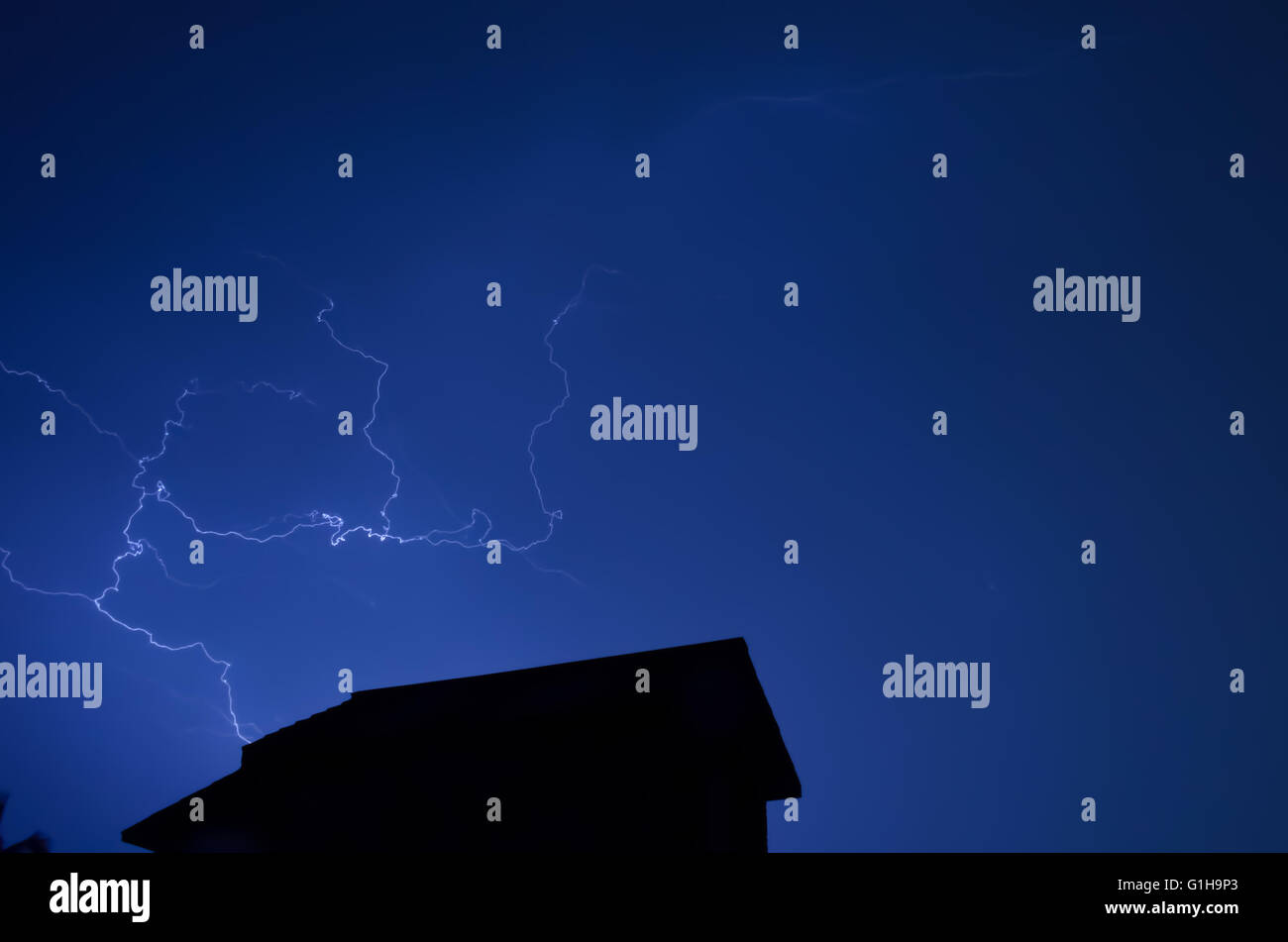 Lightning in sky during storm weather Stock Photo - Alamy