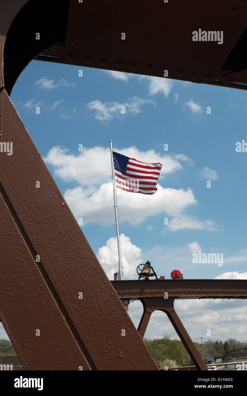 Detail of lift bridge with flag Stock Photo - Alamy