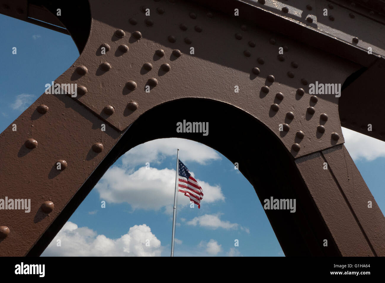 Detail of lift bridge with flag Stock Photo - Alamy