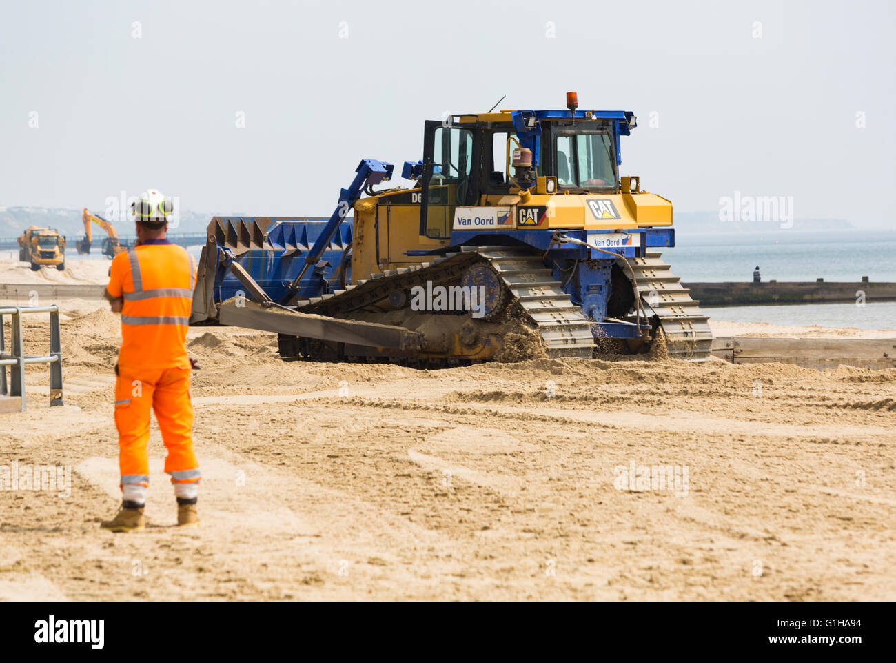 Moving sand on Bournemouth beach following landslide in April Stock ...