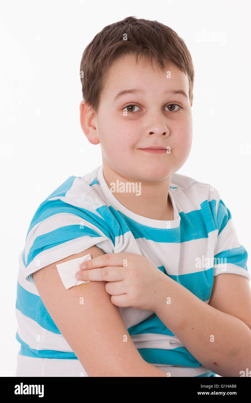 Doctor giving a child injection in arm on isolated image Stock Photo ...
