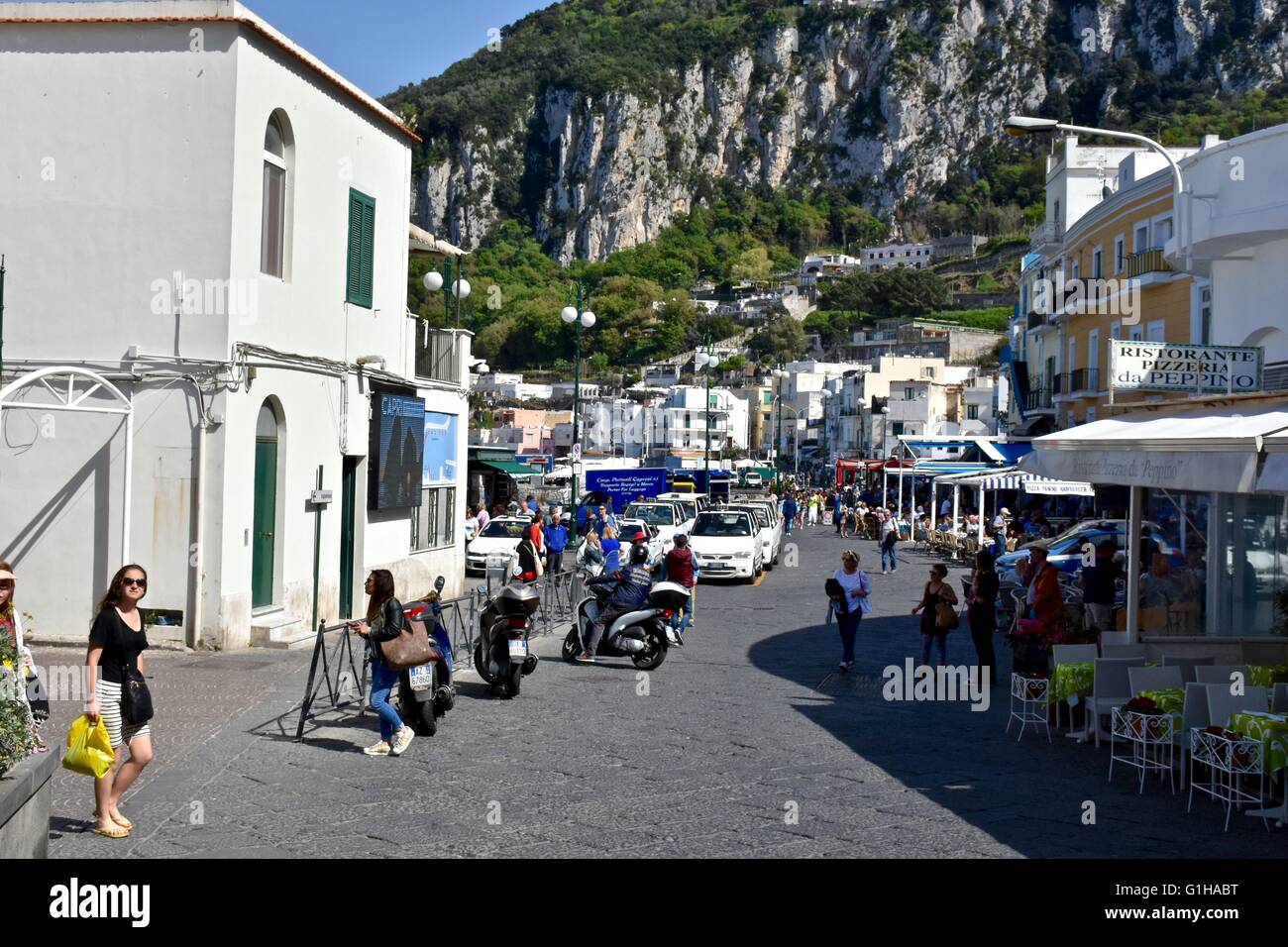 Tourists exploring the streets of Capri island Stock Photo - Alamy