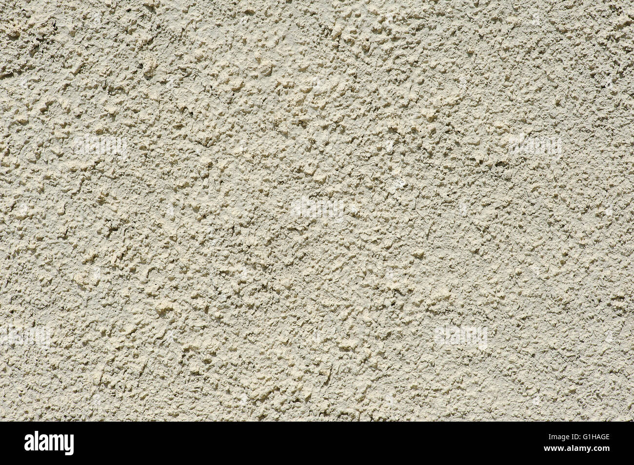 Beige roughly wall texture. Decorative plaster facade of the building ...