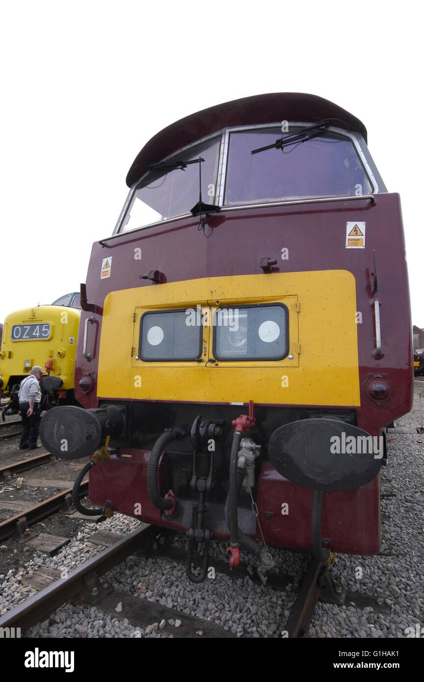 Diesel and steam locomotives in a yard Stock Photo - Alamy