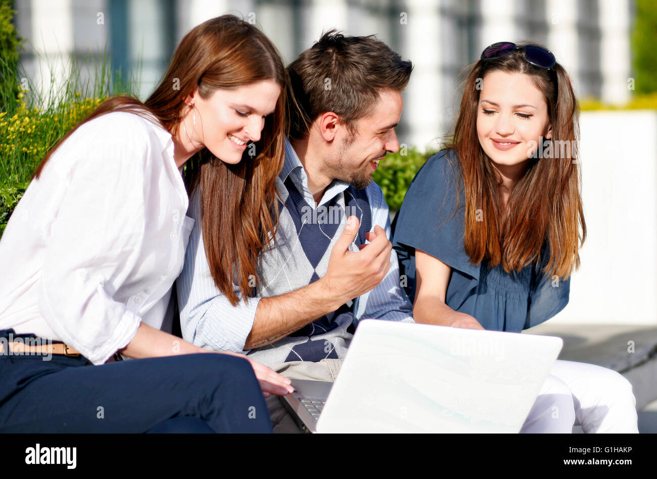 Students working outside Stock Photo - Alamy