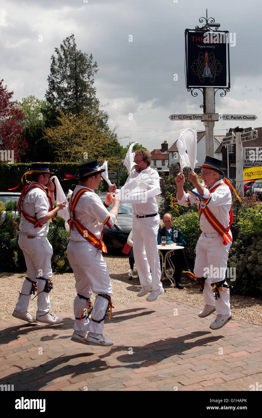 Morris dancers and musicians perform outside the Bell pub in Ticehurst ...