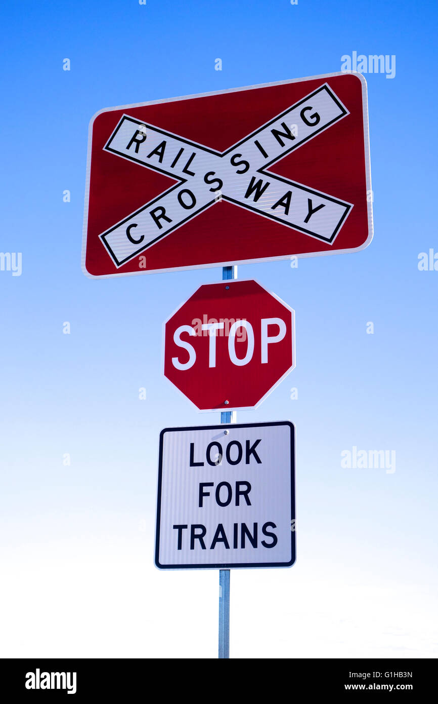 Railway Crossing Stop sign Stock Photo - Alamy
