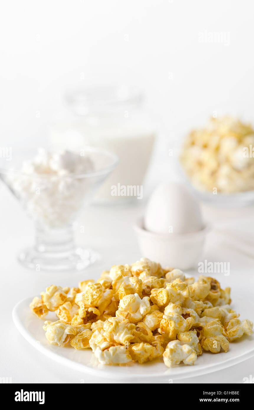 Popcorn, eggs, cheese and milk Stock Photo - Alamy