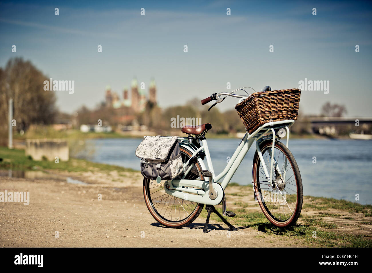 Retro Bike standing in Front of the View of the medieval romanic ...