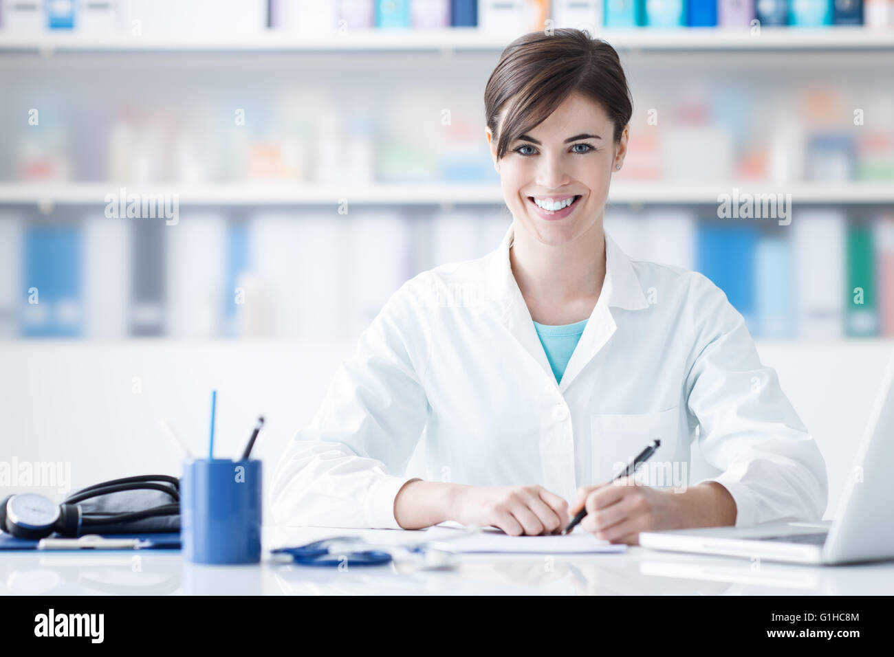 Young female doctor working office hi-res stock photography and images ...