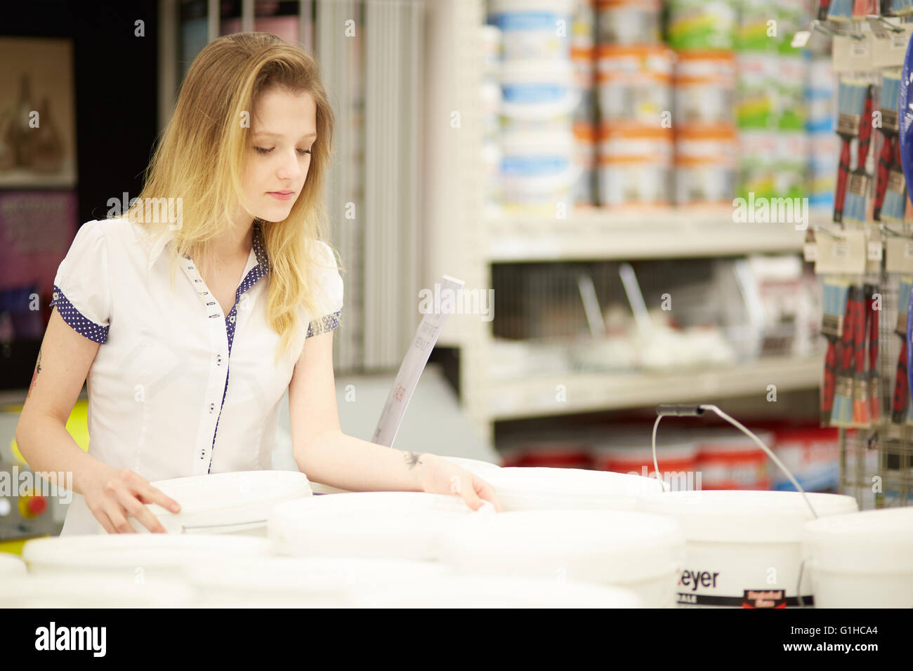 woman at hardware store Stock Photo - Alamy