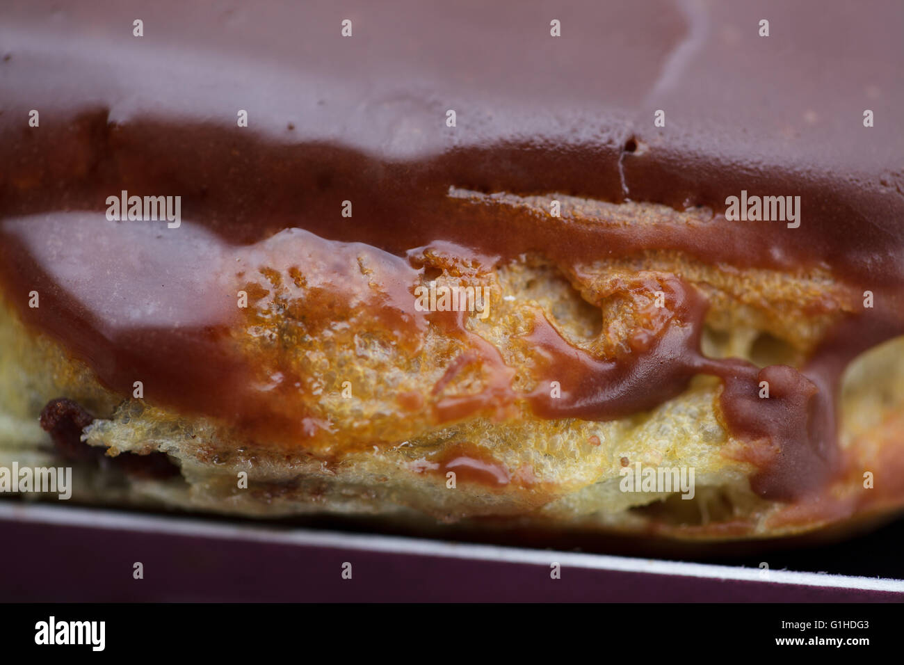 Delicious french pastry chocolate Eclair close up Stock Photo - Alamy