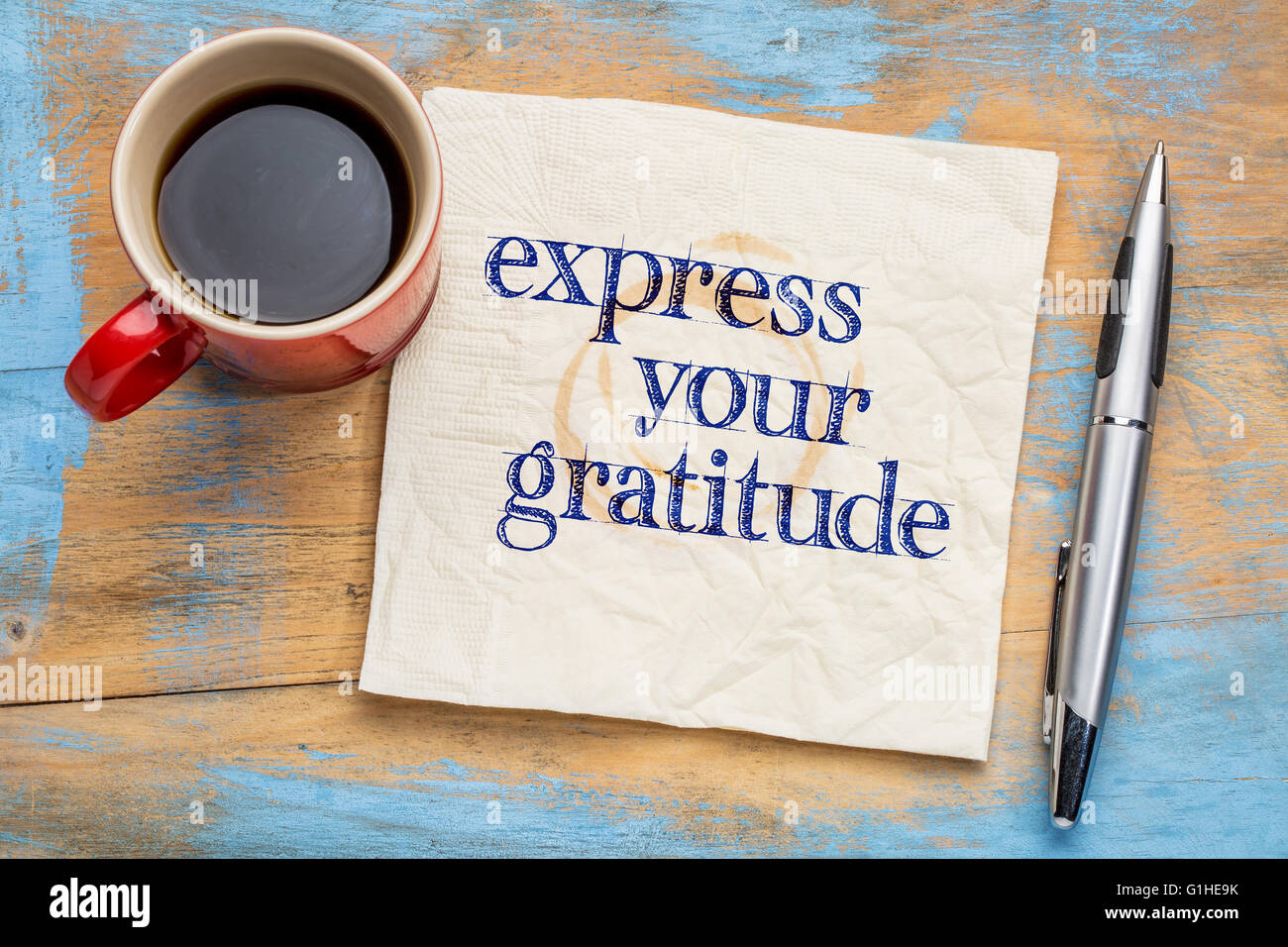 Express your gratitude - handwriting on a napkin with a cup of coffee ...