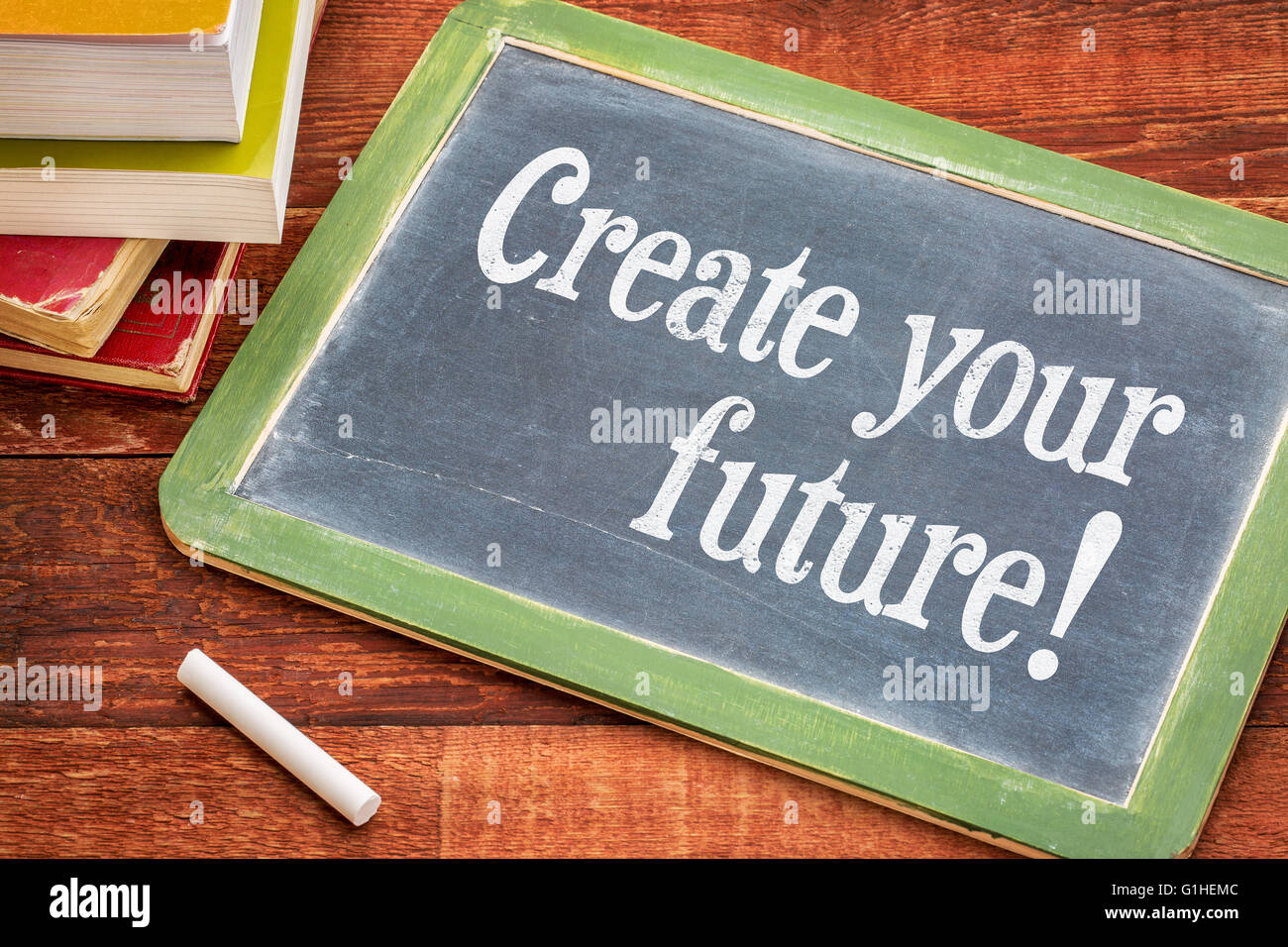 Create your future - inspirational phrase on a slate blackboard with a ...