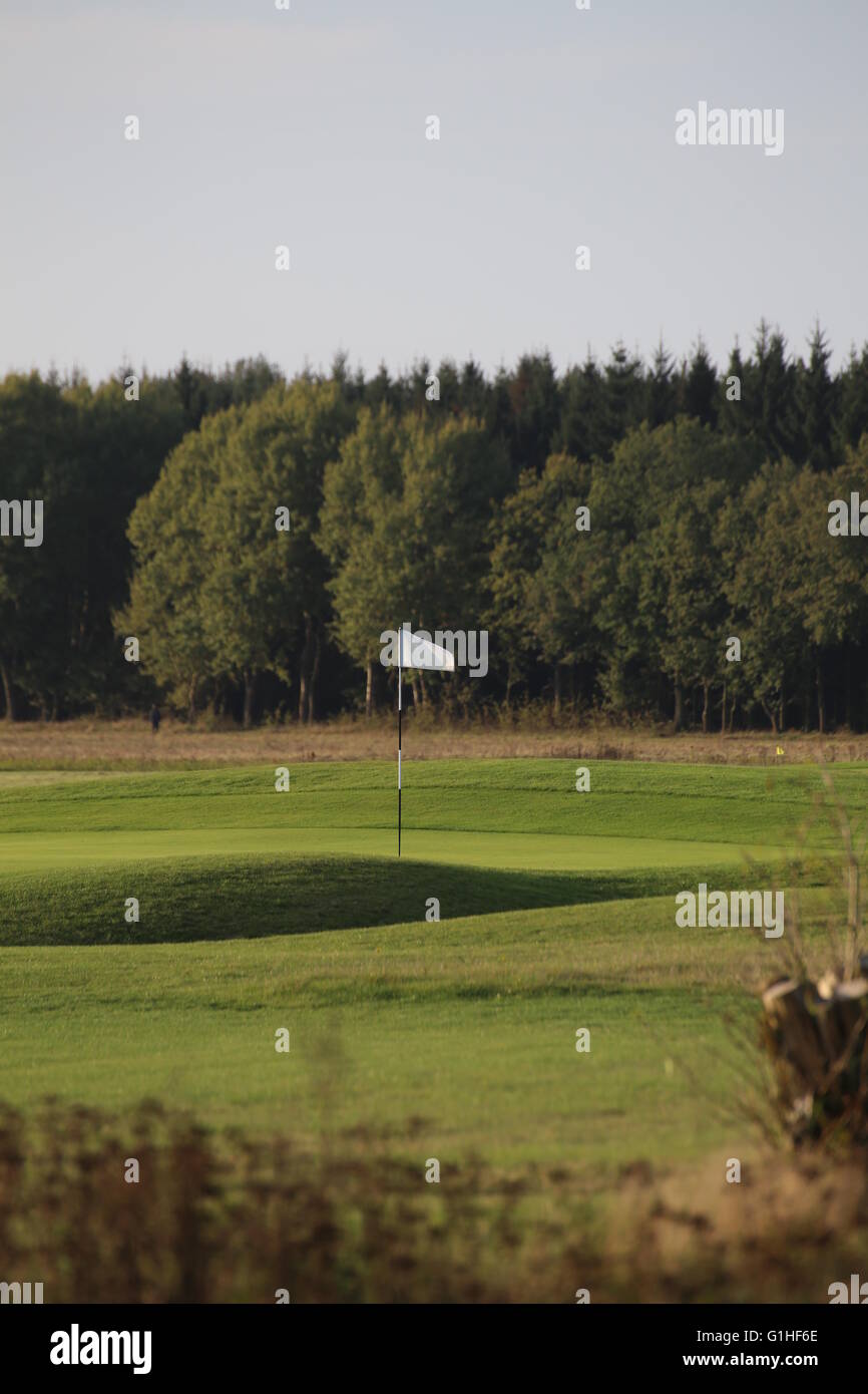 White flag on golf course Stock Photo - Alamy