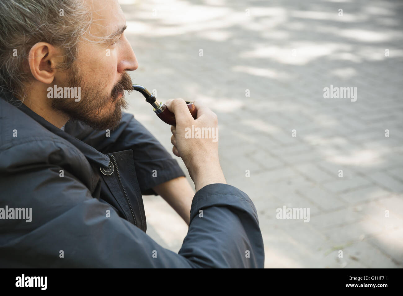 Man smoking pipe hi-res stock photography and images - Alamy
