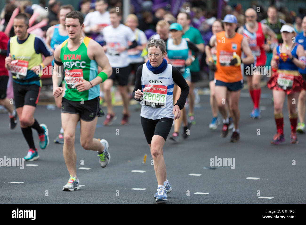 Club and fun runners at the London Marathon Stock Photo - Alamy