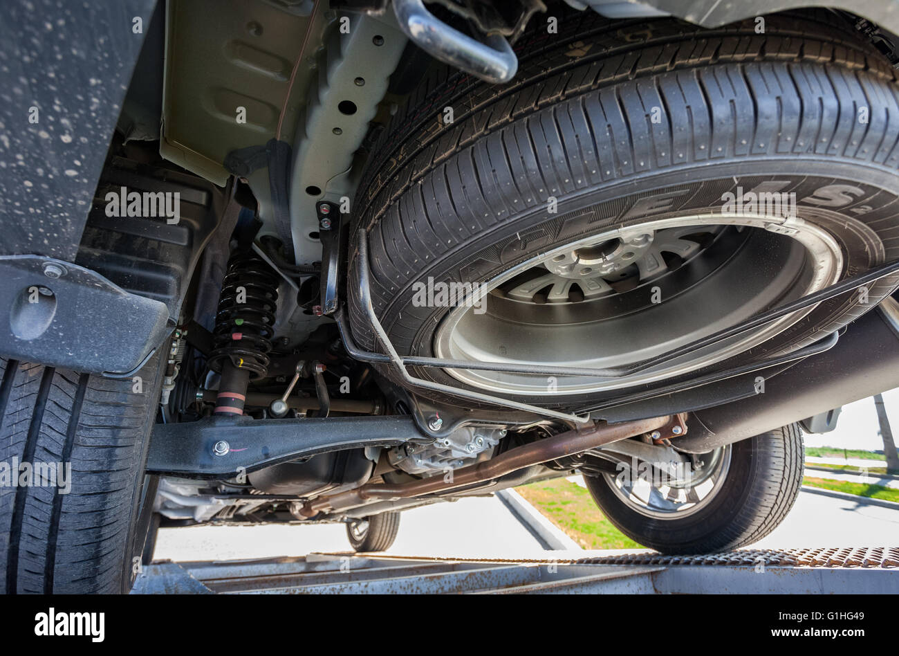 View from the bottom of the car Mitsubishi Outlander Stock Photo - Alamy