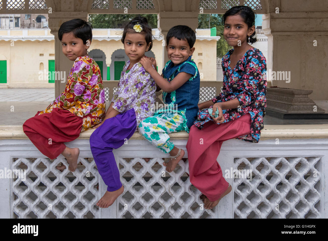 Children Sitting On Wall, Mecca Masjid (Mosque), Hyderabad Stock Photo ...