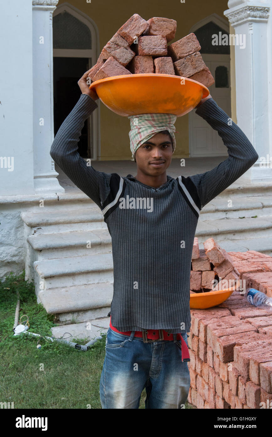 Man Carrying Bricks, Chowmahalla Palace, Hyderbad Stock Photo - Alamy