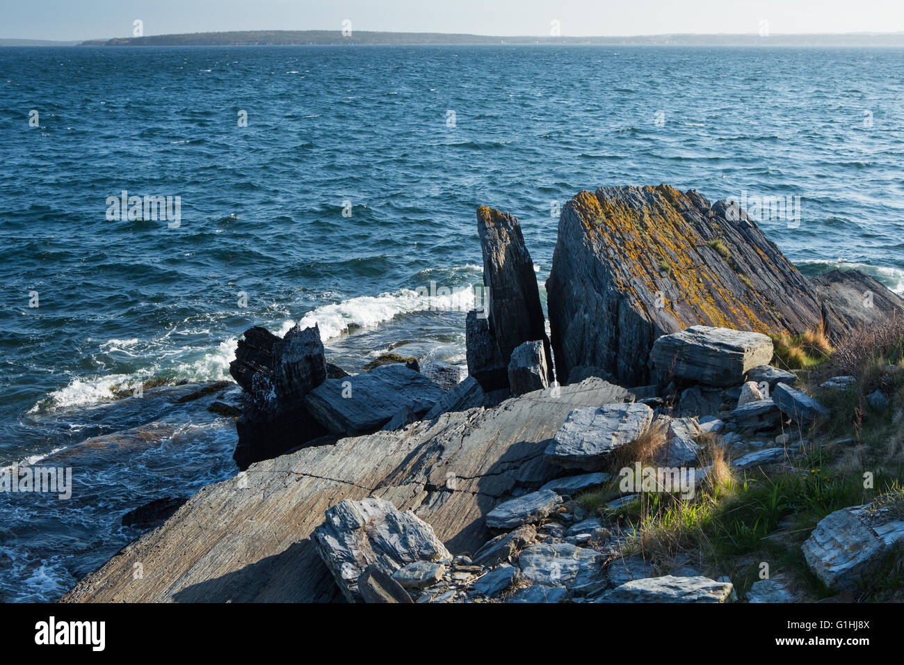 Waves rocks in blue sea hi-res stock photography and images - Alamy