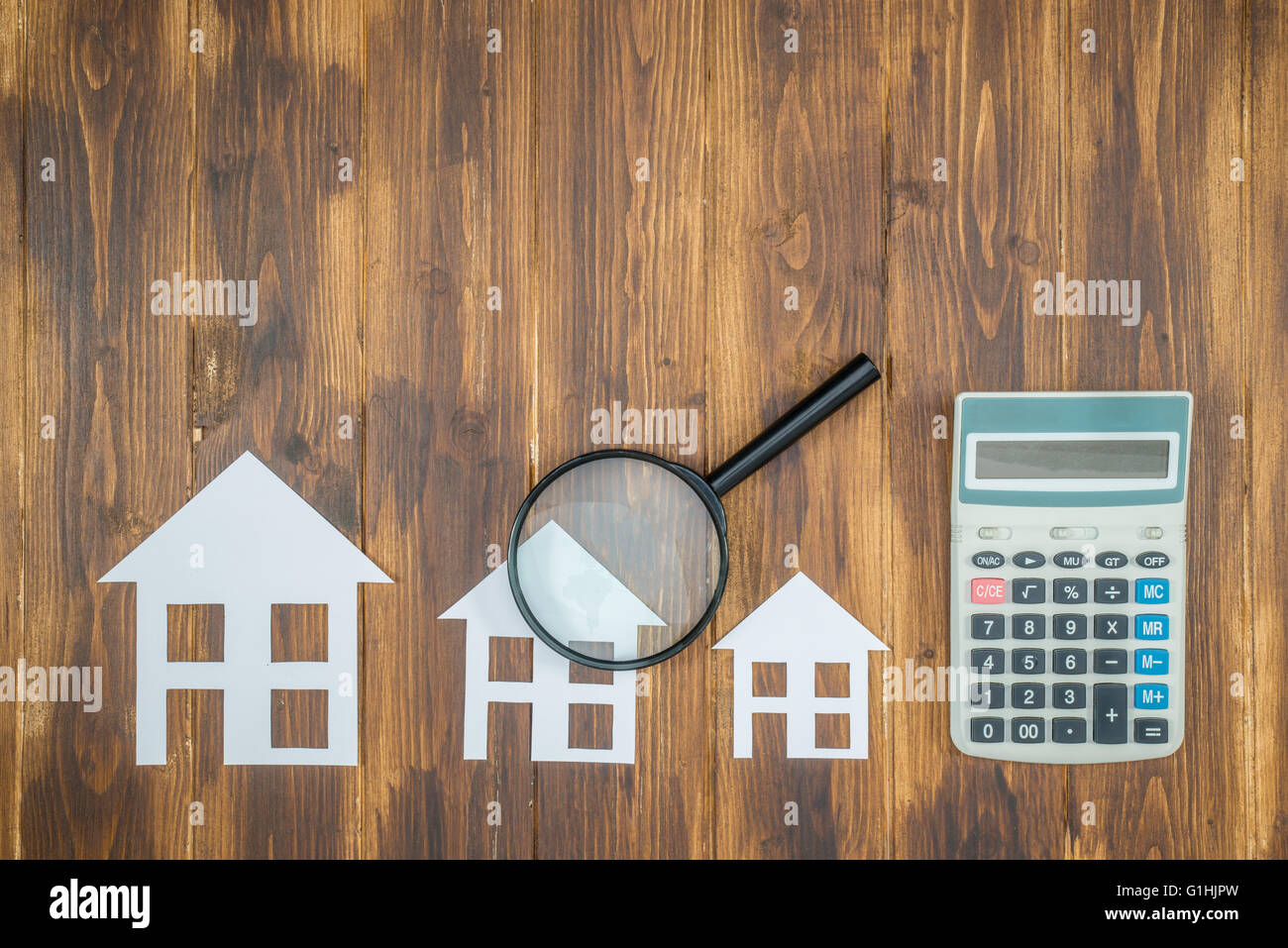 Buy house mortgage calculations calculator hi-res stock photography and ...