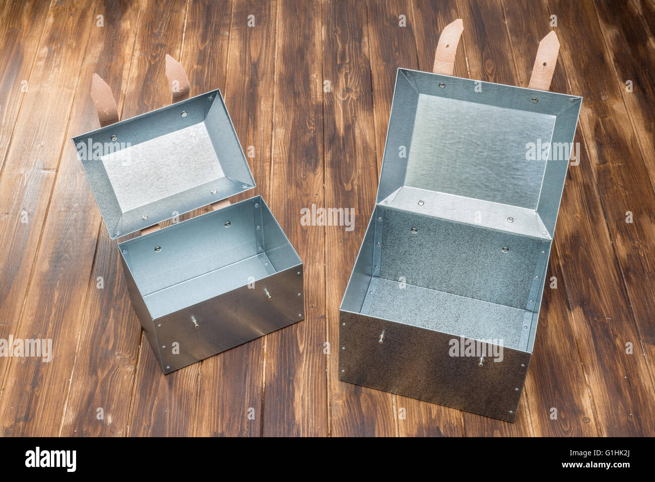 two metal tool box on wooden table, Studio Shot Stock Photo - Alamy