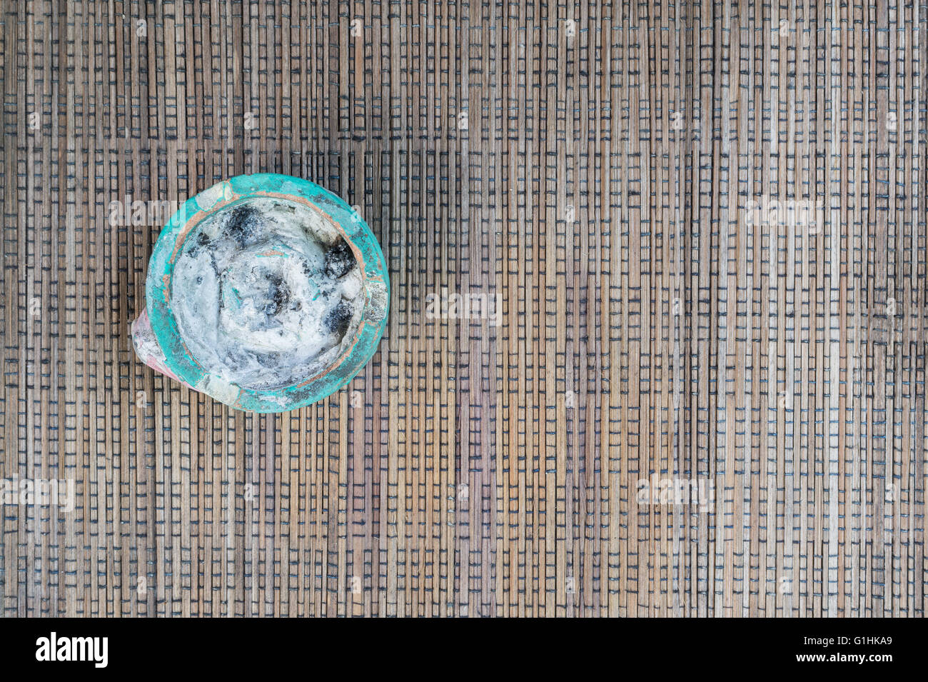 Empty ashtray on brown woven cloths on the left side Stock Photo - Alamy