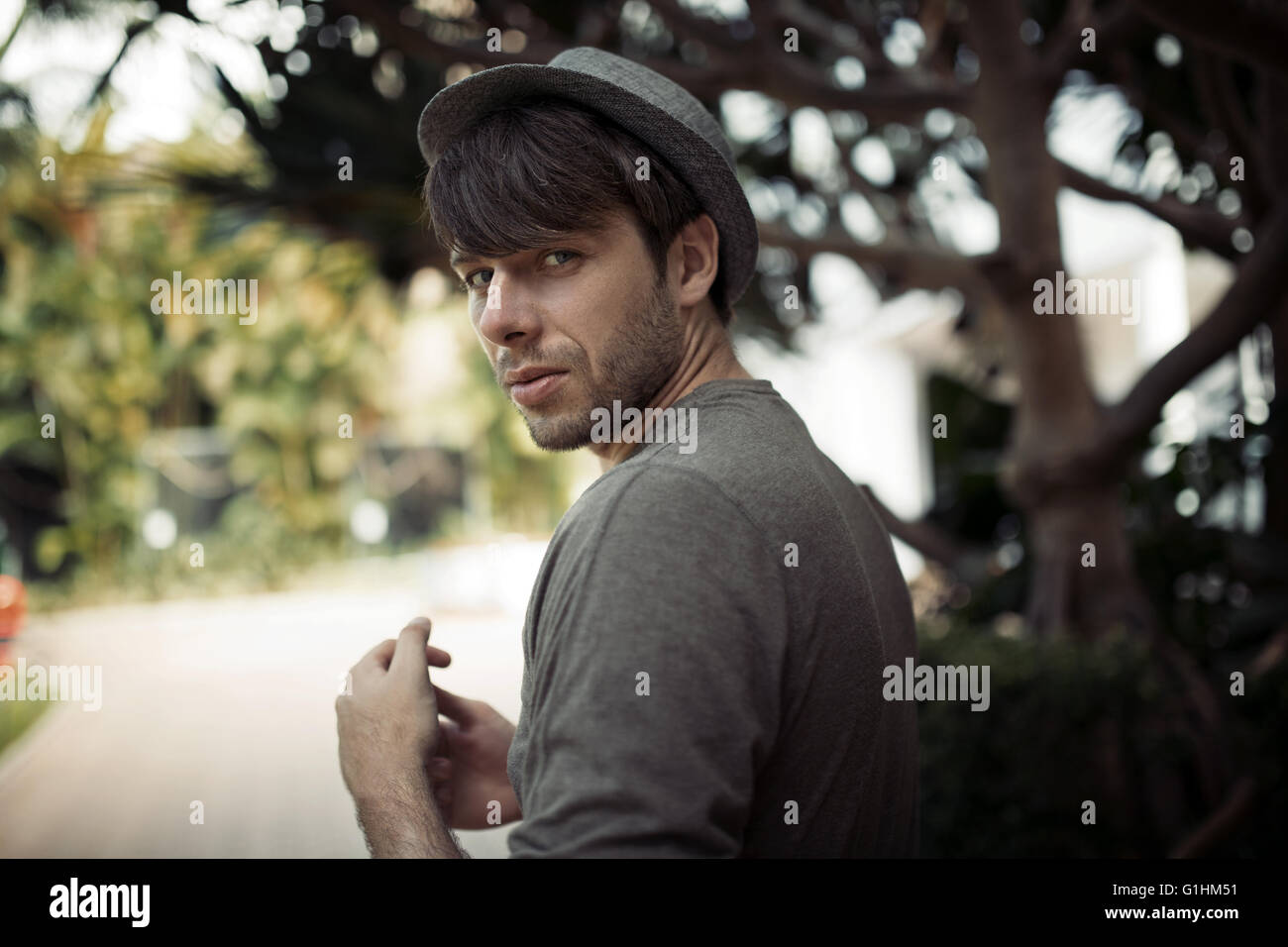 Handsome guy in the exotic paradise Stock Photo - Alamy