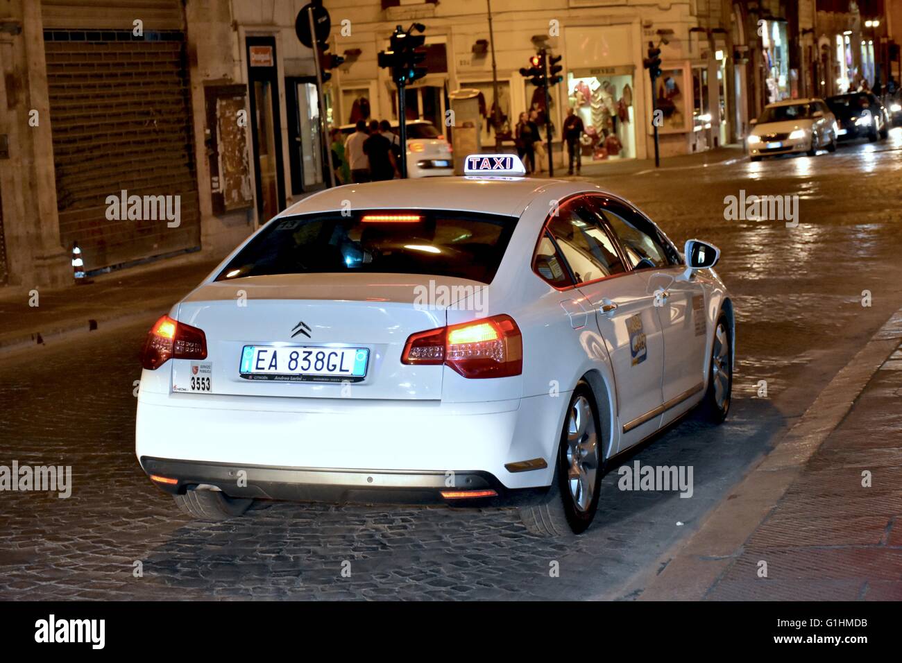 A white luxury taxi cab in downtown Rome Stock Photo - Alamy