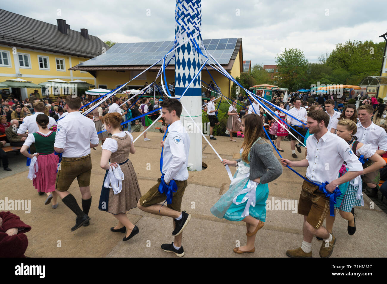 Dance around maypole traditional costume hi-res stock photography and ...