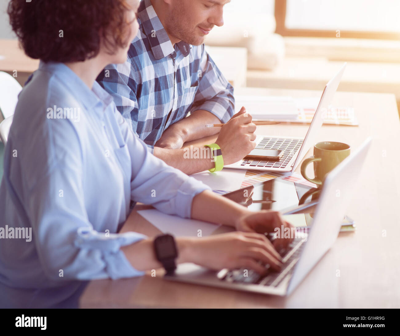 Work working together surface hi-res stock photography and images - Alamy