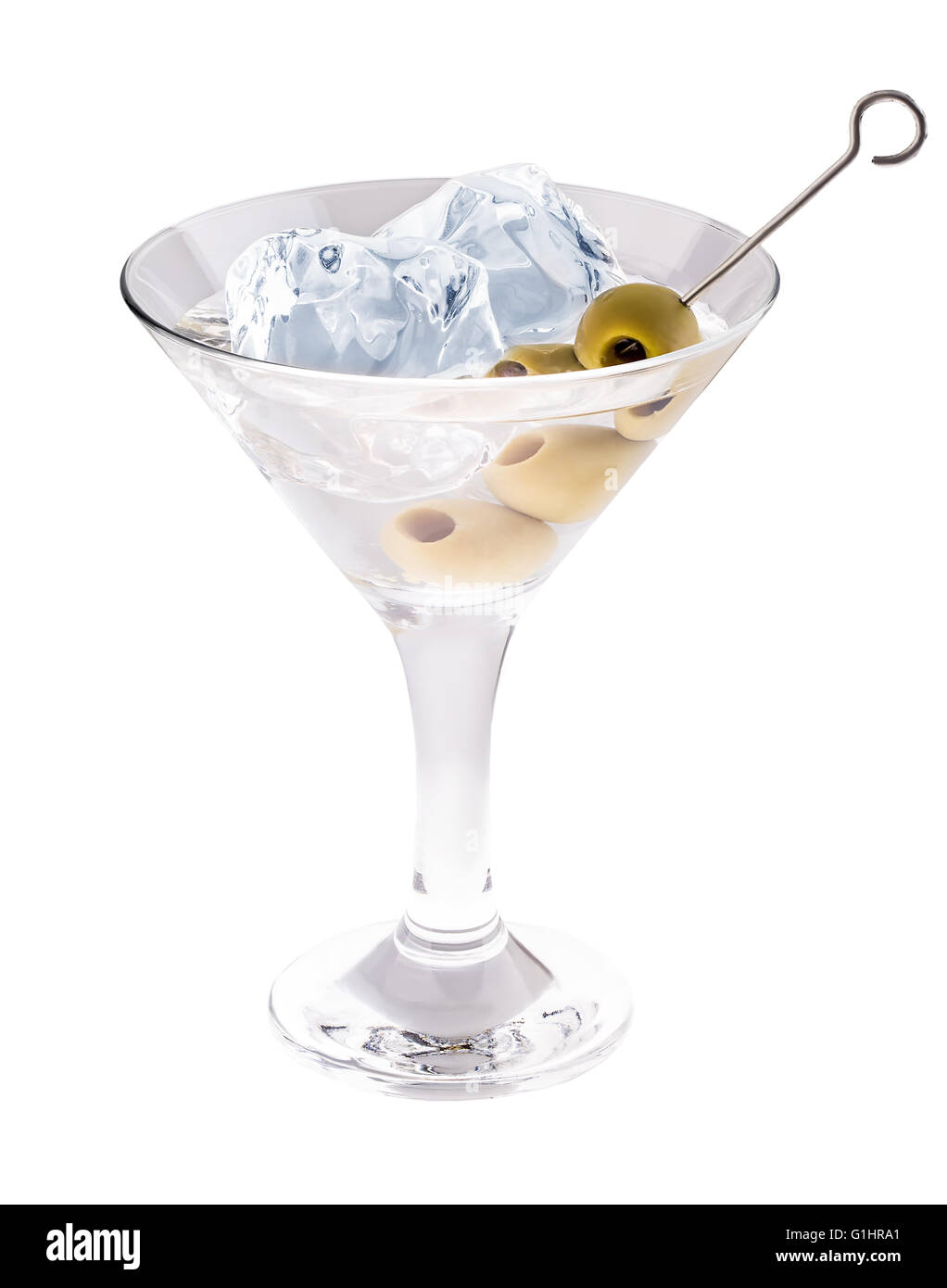 Delicious cocktail with olives and ice cubes in martini glass on a ...