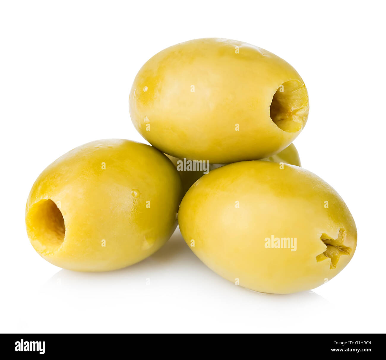 Three green olives isolated on white background Stock Photo - Alamy