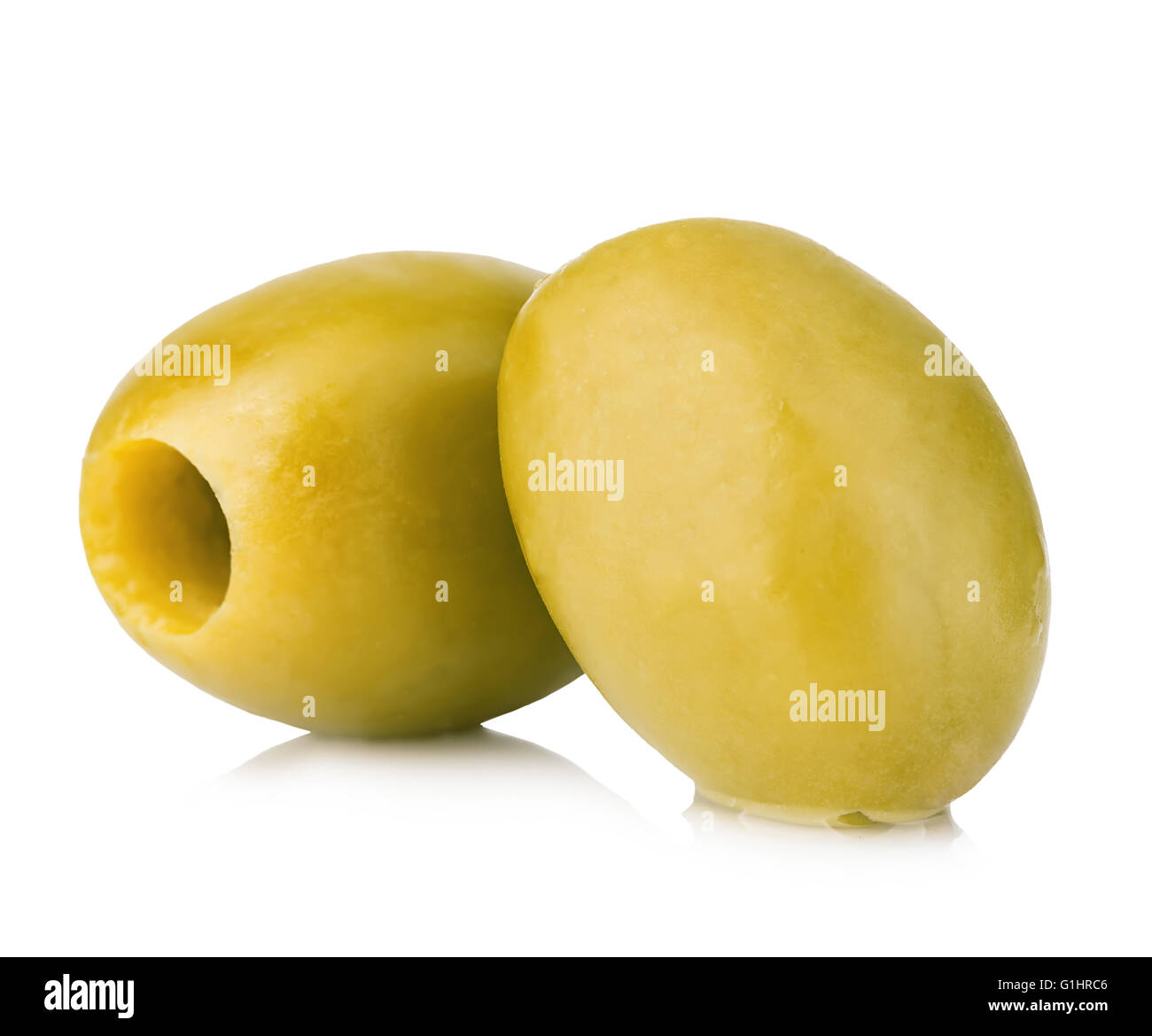 Two green olives isolated on white background Stock Photo - Alamy