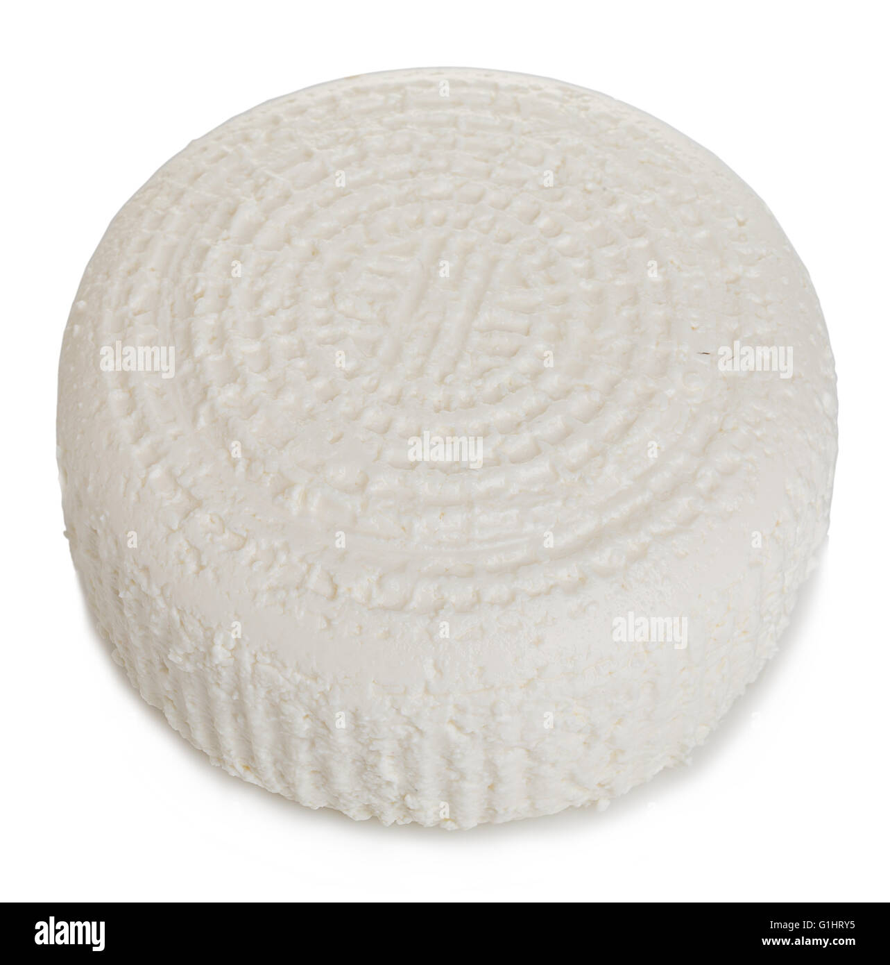 Wheel of traditional fresh cottage cheese close-up isolated on a white ...