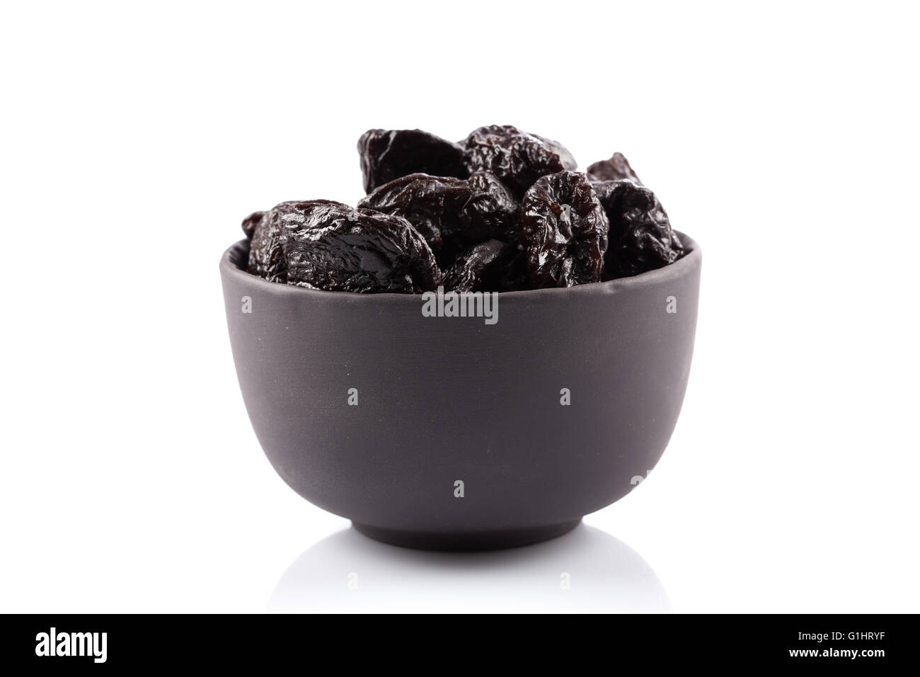 Dried plum - prunes fruits isolated on a white background Stock Photo ...