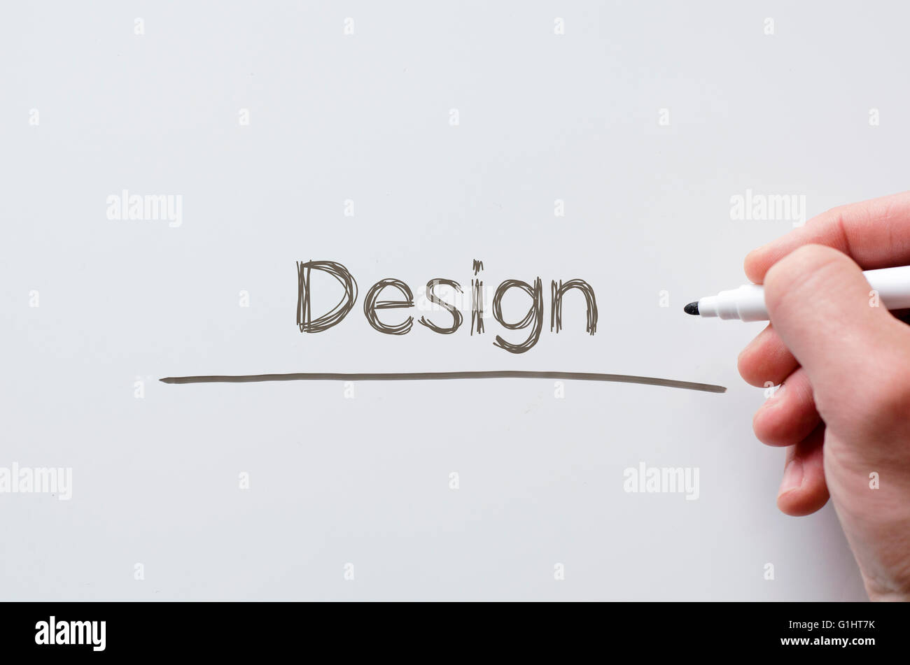 Human hand writing design on whiteboard Stock Photo - Alamy