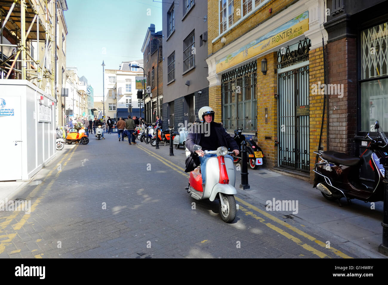 Man riding a moped hi-res stock photography and images - Alamy