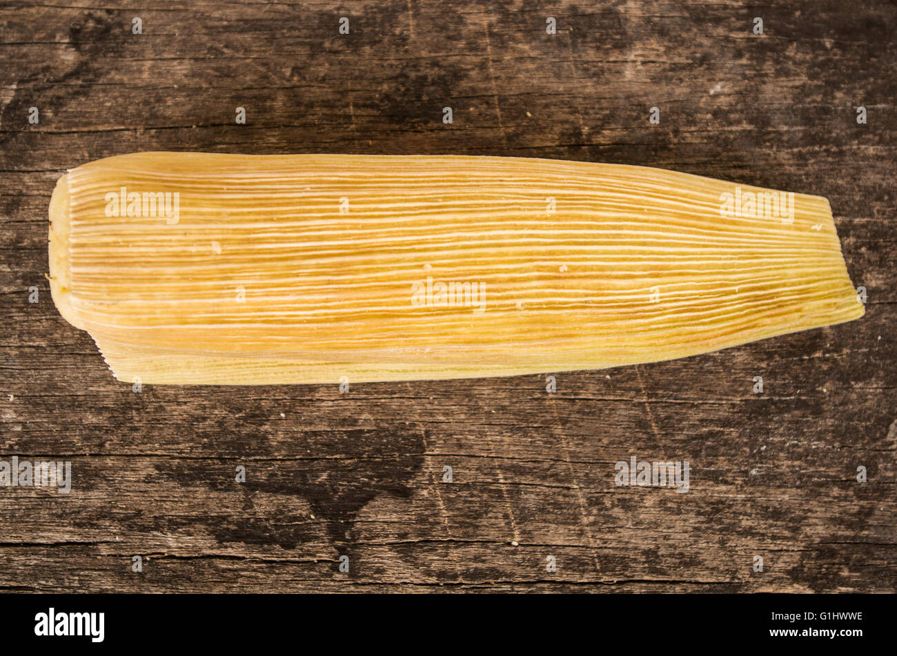 Closeup traditional ecuadorian humitas lying on wooden surface, very ...